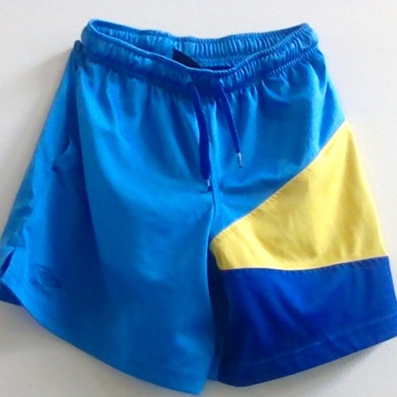 Umbro | Bottoms | Umbro Blue And Yellow Running Shorts | Poshmark